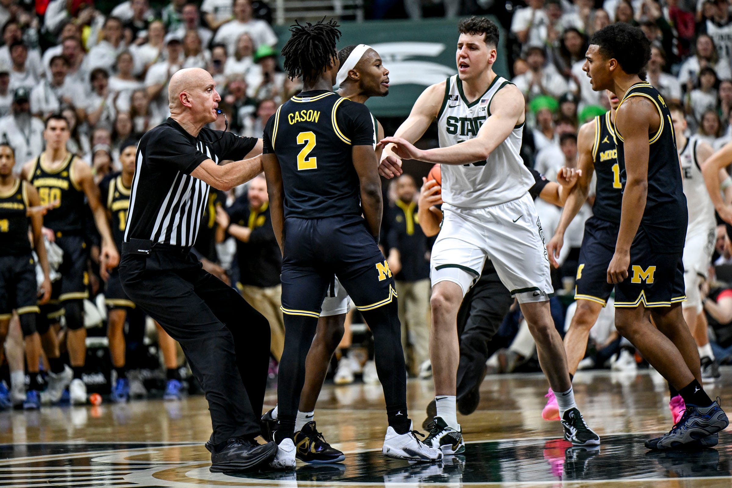 Can Michigan-Michigan State play in March Madness? How rivals can play ...