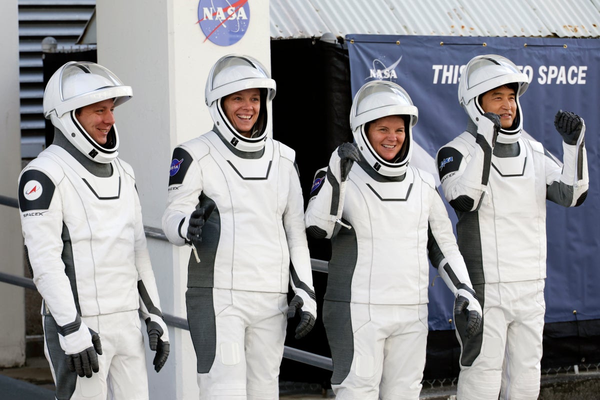 Nasa’s stranded astronauts welcome SpaceX crew to International Space ...