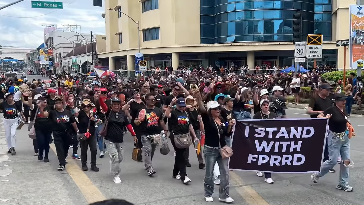 WATCH: Davao City residents march in black at Araw ng Dabaw, Manila and ...