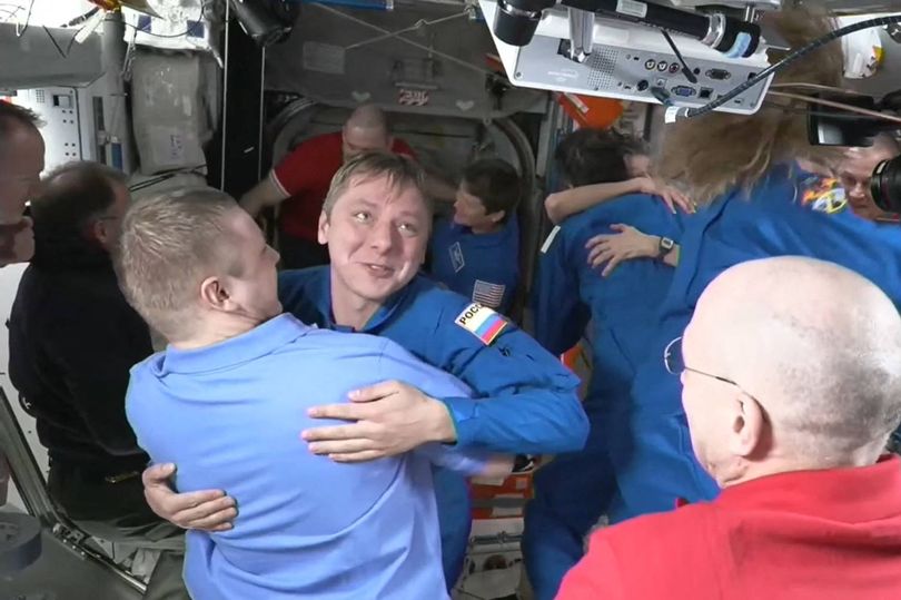 Astronauts hug SpaceX Falcon 9 rescuers after nine months stranded on ISS