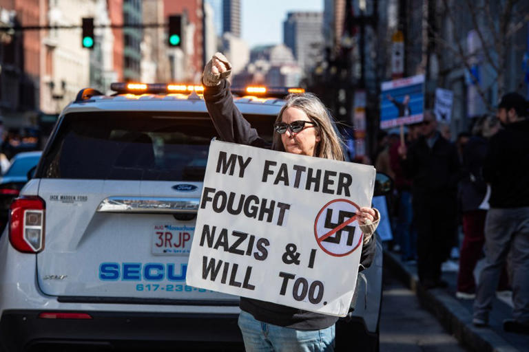 Hundreds protest Tesla showrooms over Musk’s DOGE work