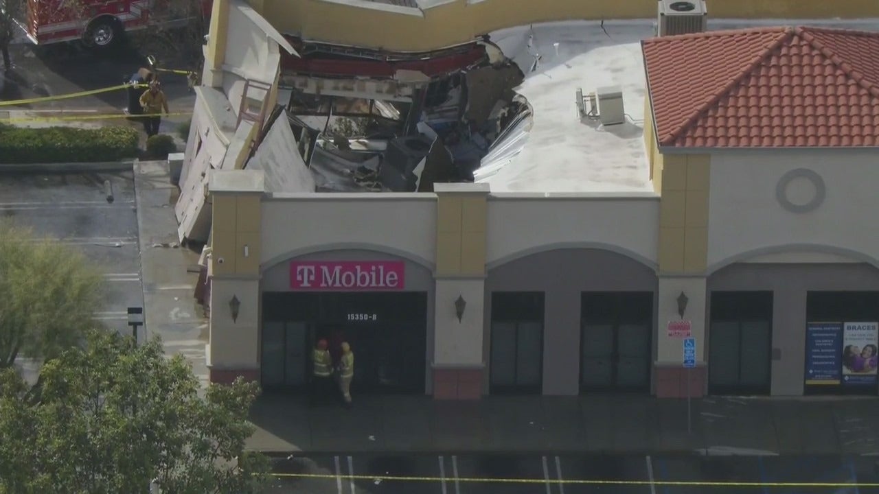 Roof of North Hills building collapses after sheared fire hydrant ...