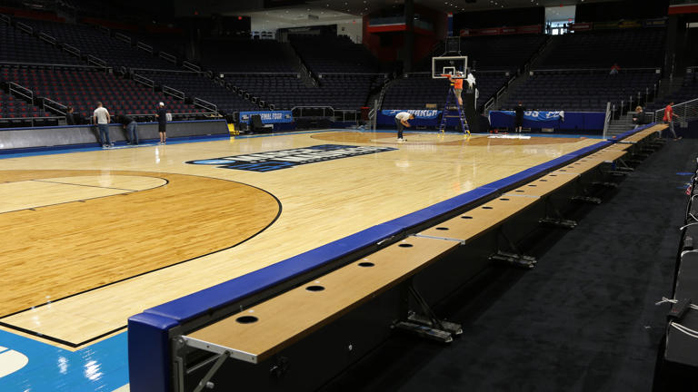 PHOTOS: Floor for first March Madness matchups installed at University ...