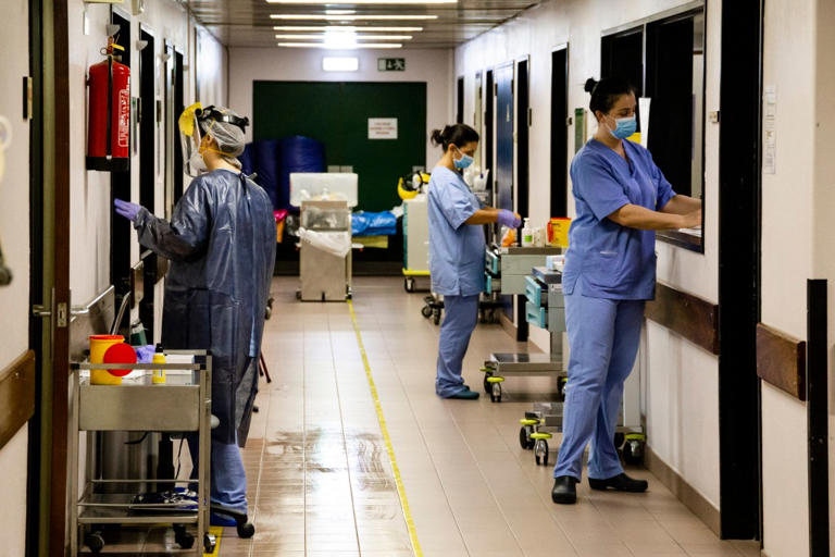 As AI nurses reshape hospital care, human nurses are fighting back to ...