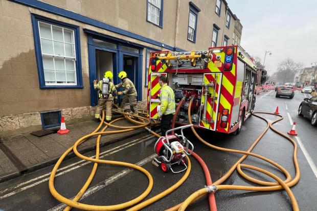 Firefighters deal with simulated basement fire in vacant building