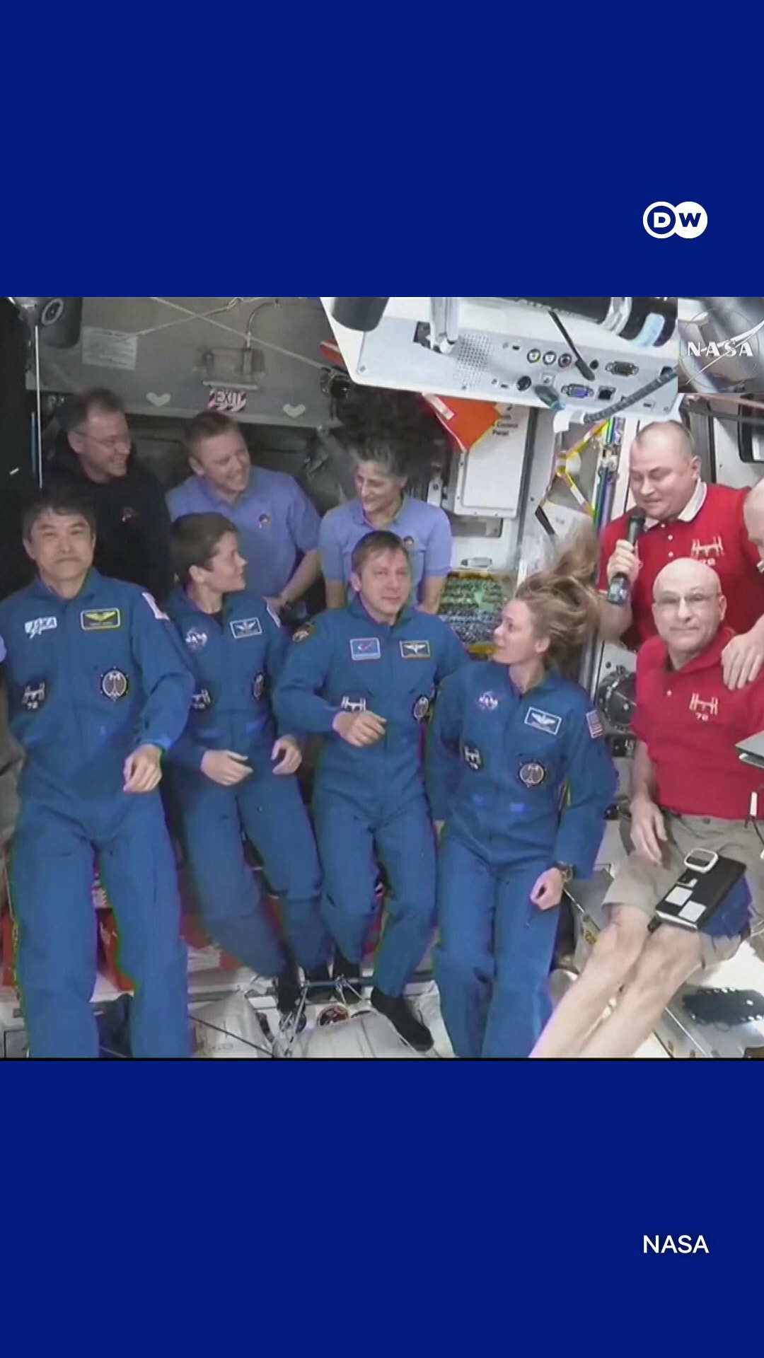 Stranded astronauts welcome new crew on ISS