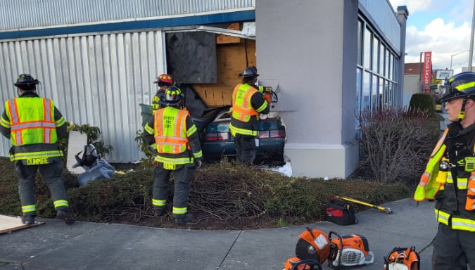 One person hurt after car crashes into Everett business