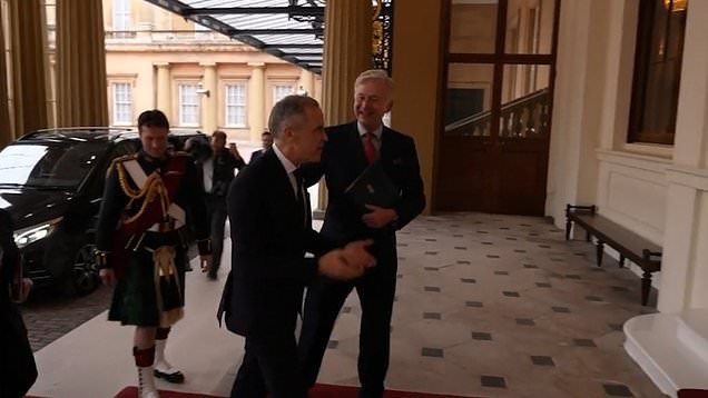 Mark Carney is greeted by equerry Johnny Thompson as he meets King