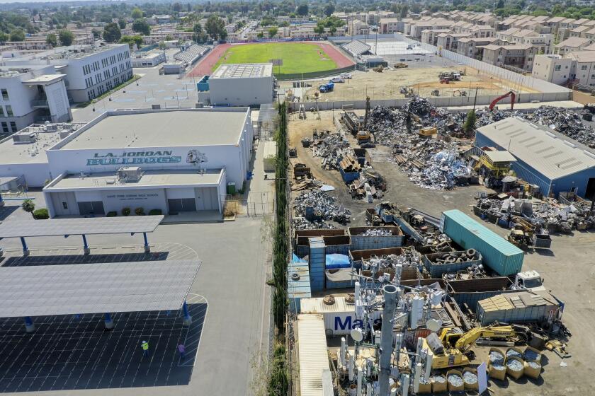 Judge shuts down recycling plant accused of spewing toxins onto L.A. school