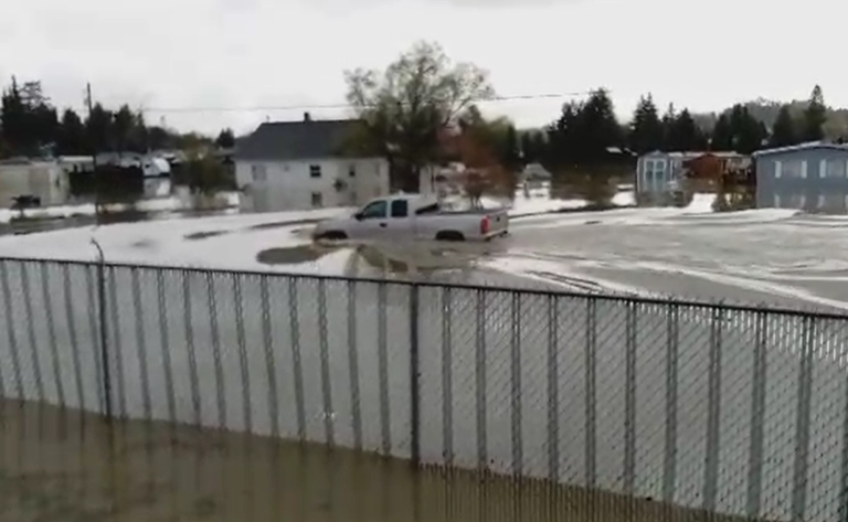 Deadly flooding in southwest Oregon, multiple people rescued from high ...