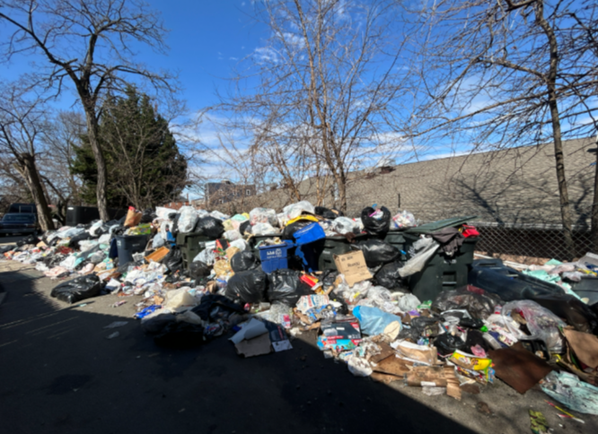 Massive trash pile grows at Northeast DC apartment complex