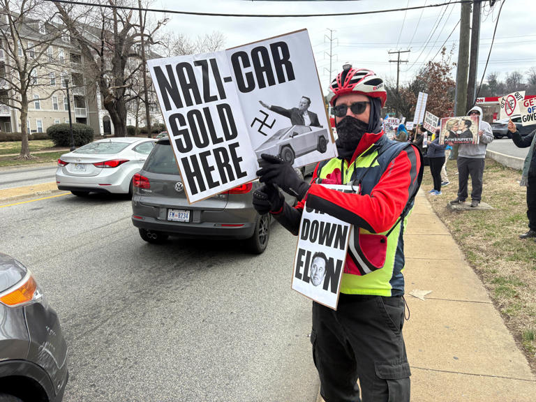 'In Your Face' Tesla Protest In Arlington Targets Trump, Musk Policies