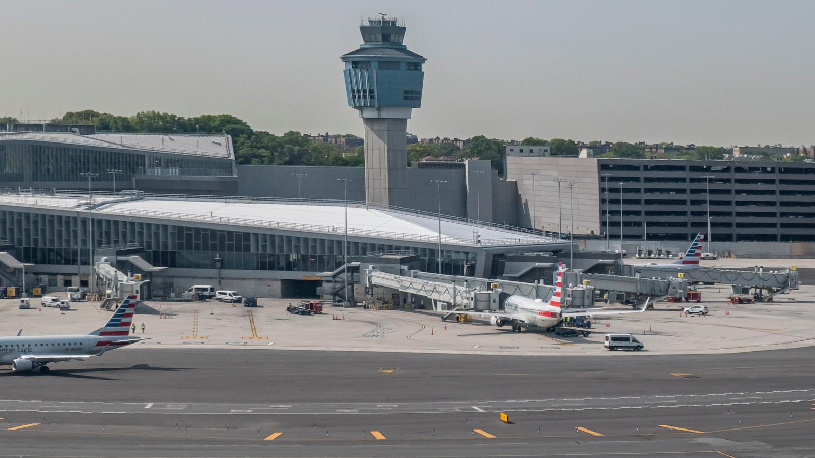 Plane's wing hits runway while landing, pilots initiate 'go-around'