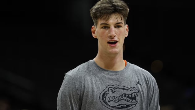 Florida's 7-foot-9-inch player Olivier Rioux doesn't need ladder to cut ...