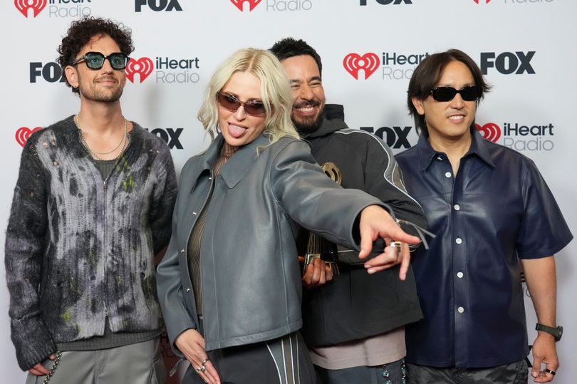 Linkin Park members 'fight' over iHeartRadio Music Award at the 2025 ...