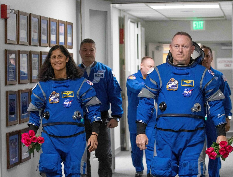 Astronauts stuck in space begin their return journey home