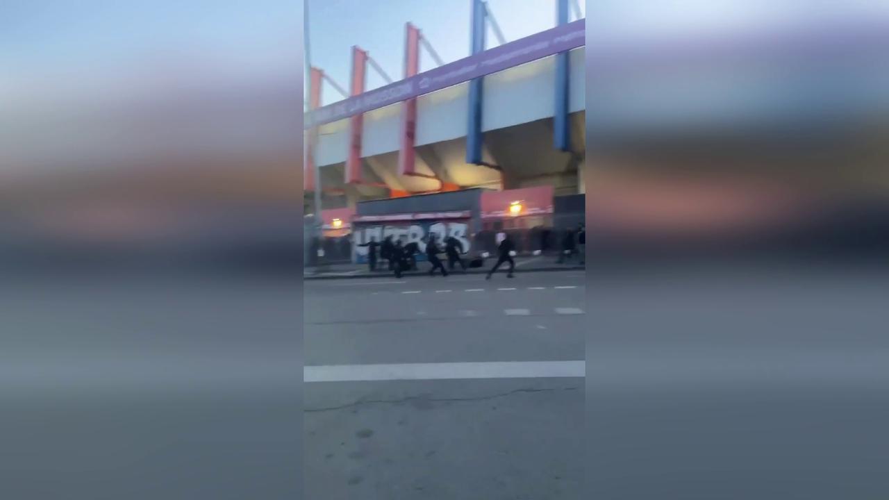 Riot police chase fans amid football crowd violence in France