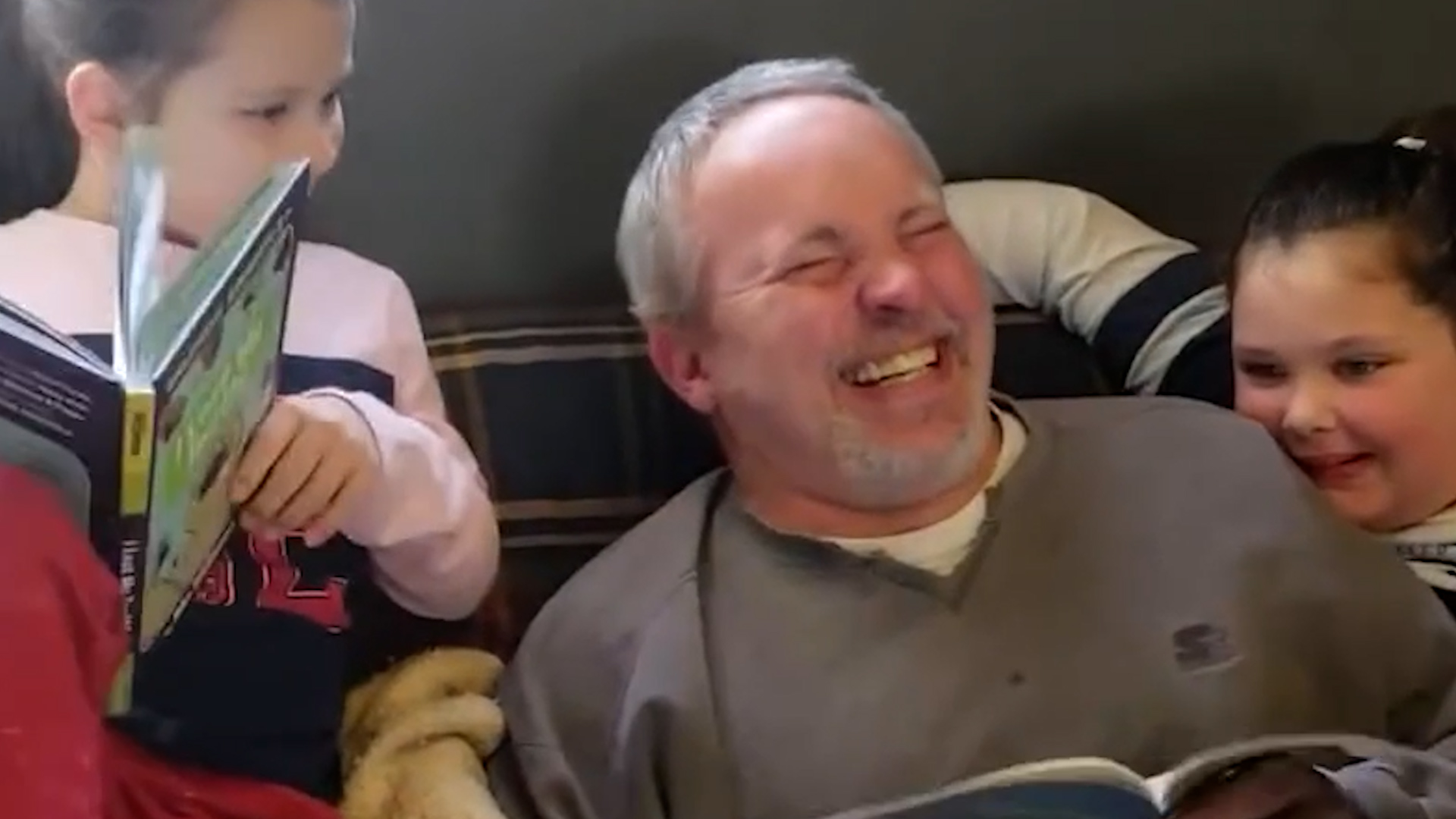 Dad can't keep a straight face while reading The Wonky Donkey
