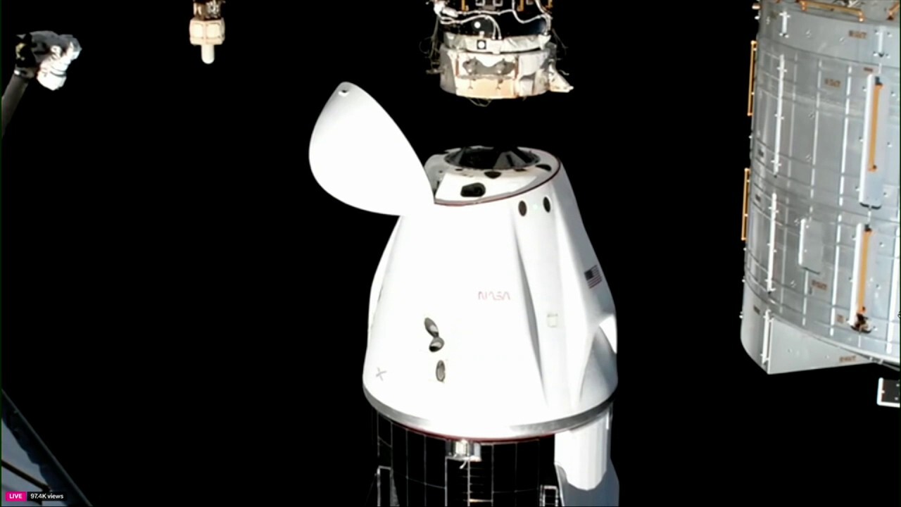 Stranded astronauts on SpaceX capsule undock from space station