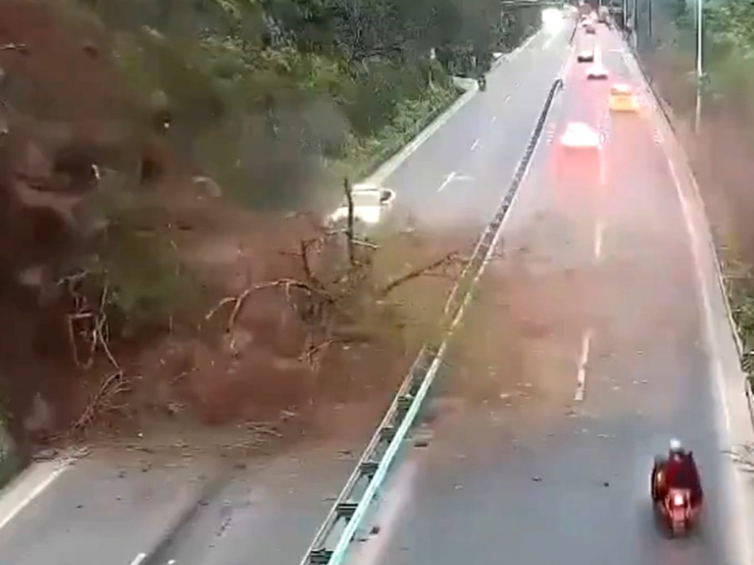 Landslide! Entire slope crashes onto busy road