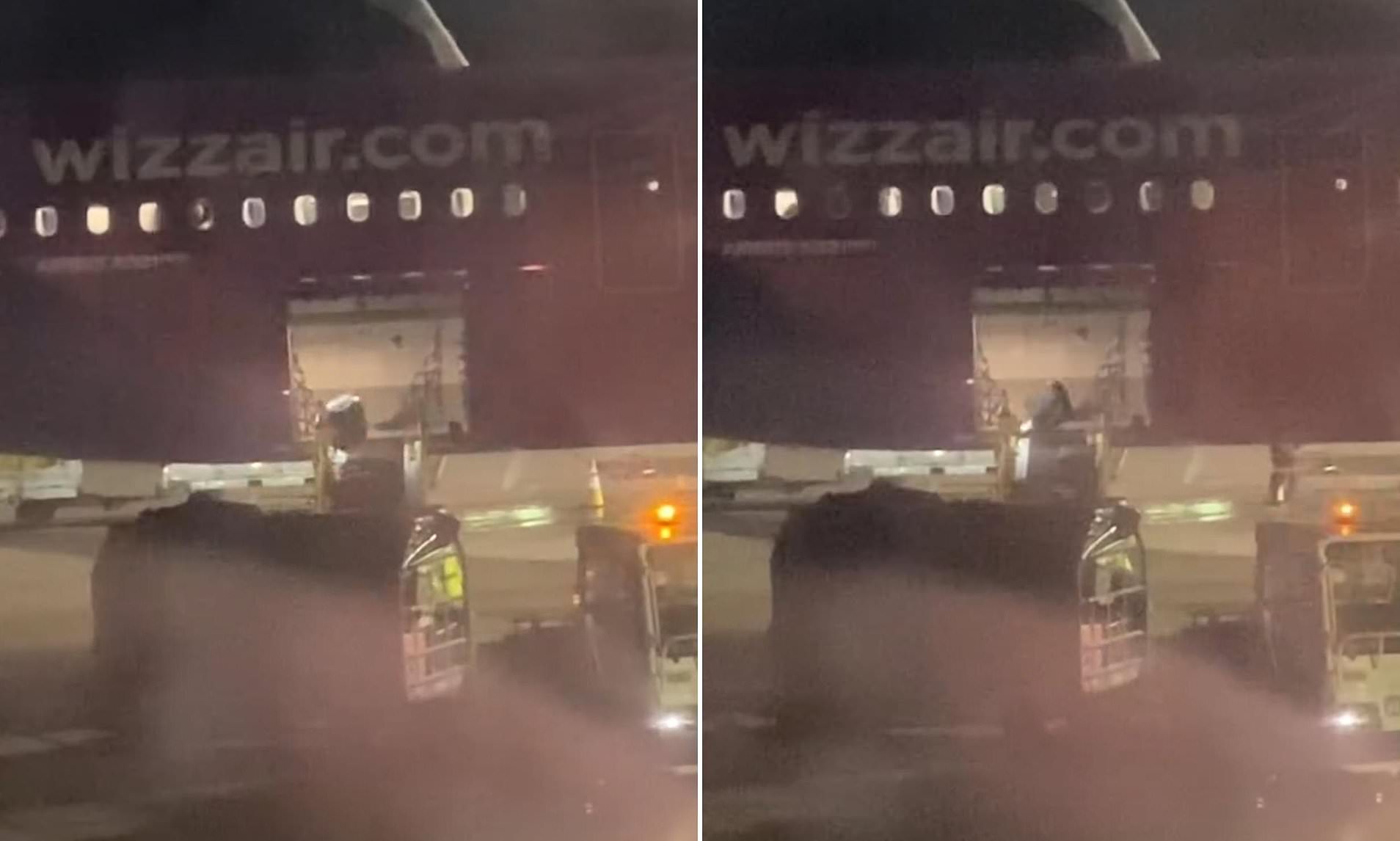 Shocking moment baggage handler throws suitcases from jet