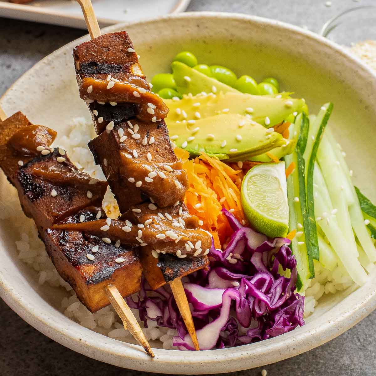 Tofu Poke Bowl with Peanut Satay Sauce: A Fusion of Flavors