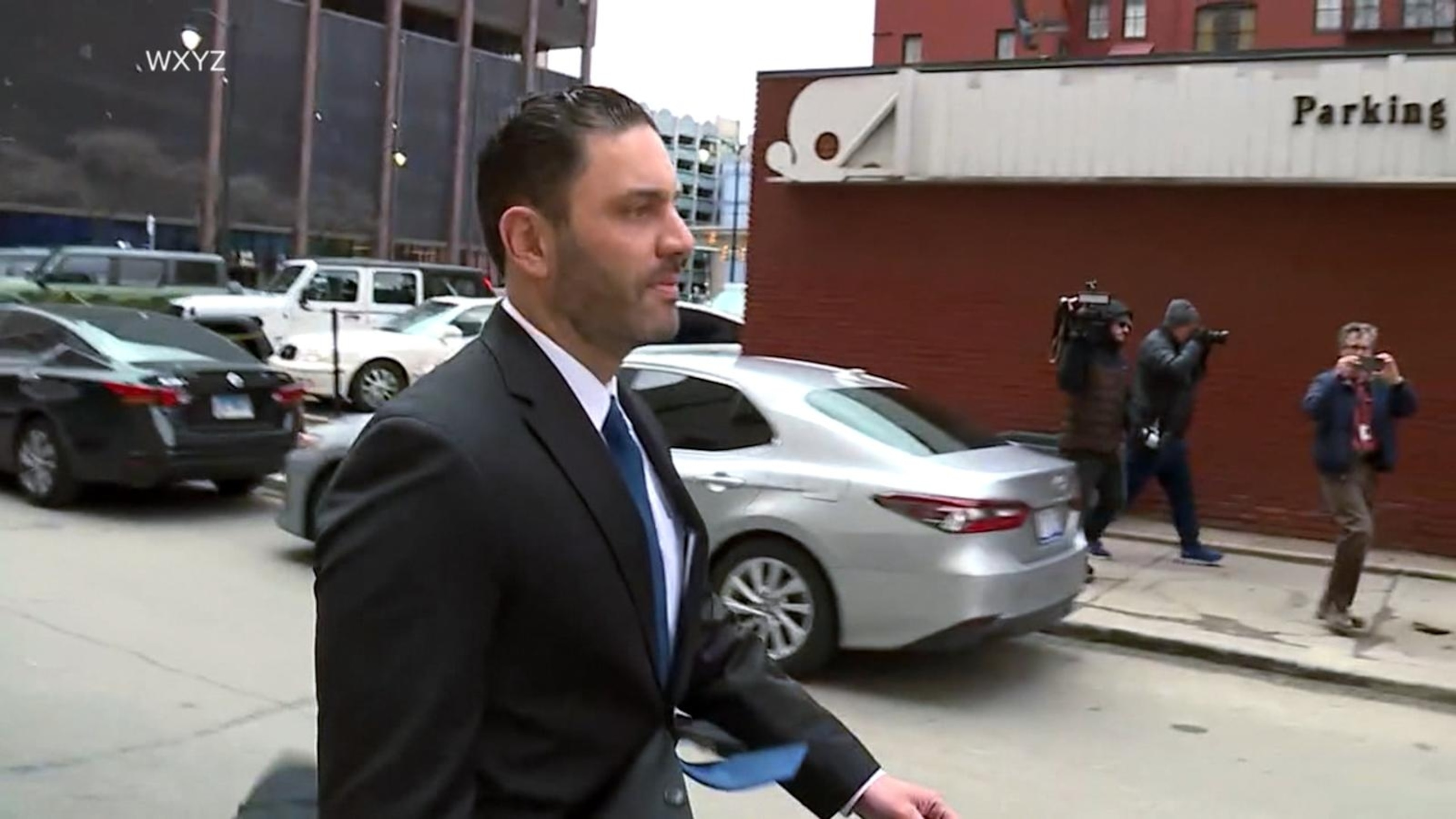 Former college football coach charged in massive ID theft