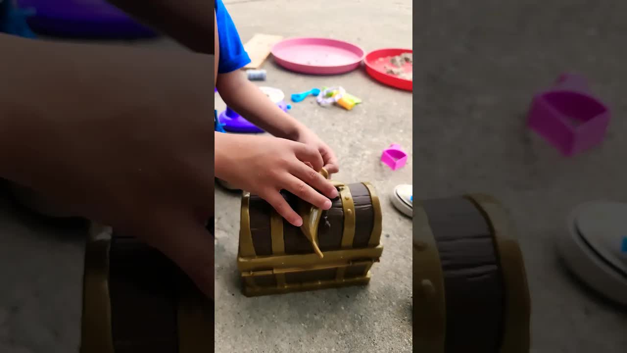 Kids Playing with Kinetic Sand and Treasure Chest