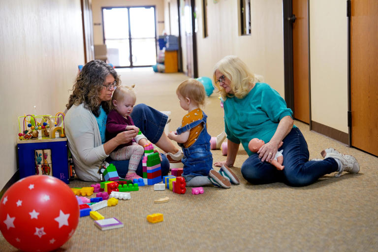 Senior adult volunteers are helping an intergenerational preschool ...