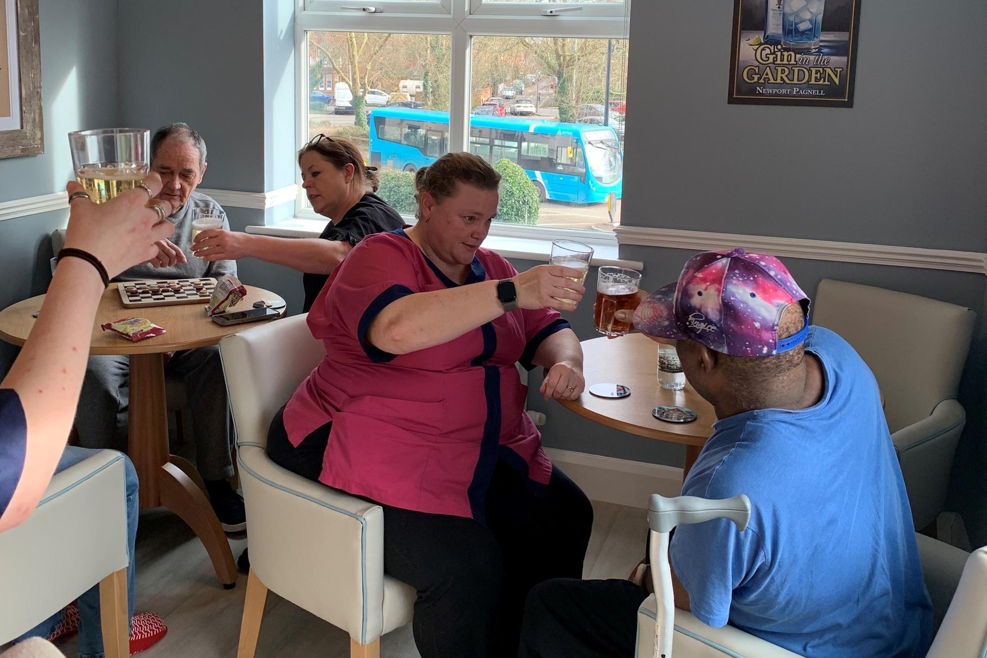 Cheers to a great idea! Fun-loving care home opens its own pub for its ...