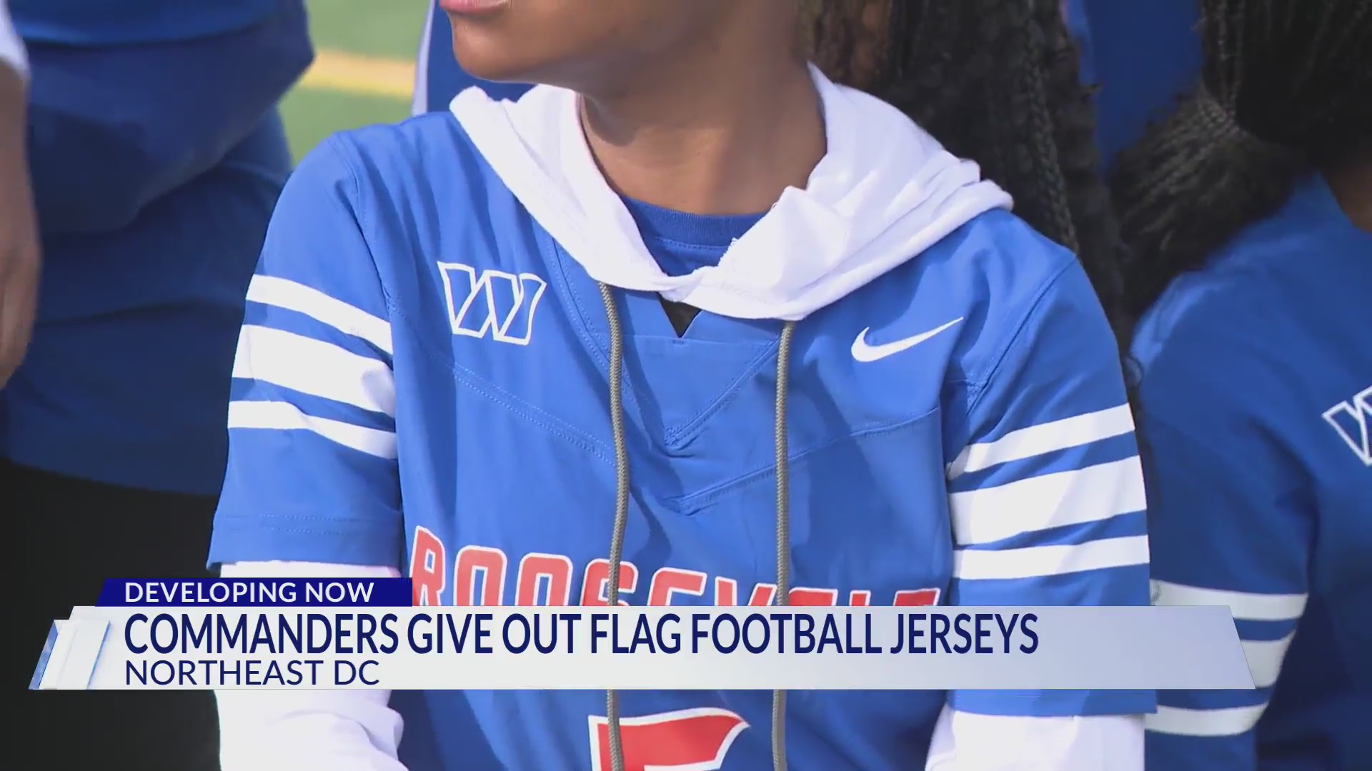 Commanders give out flag football jerseys in DC