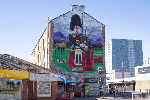 Call to remove 'hostile and provocative' Glasgow mural of bagpiper
