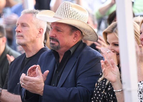 Garth Brooks cries at wife Trisha Yearwood's Hollywood Walk of Fame ...