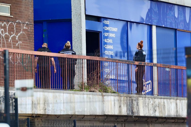 Photos from huge Hanley police cordon as man scales building