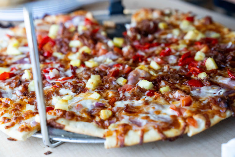 Fong's Pizza reveals an updated menu and giant dragon decor at its new ...