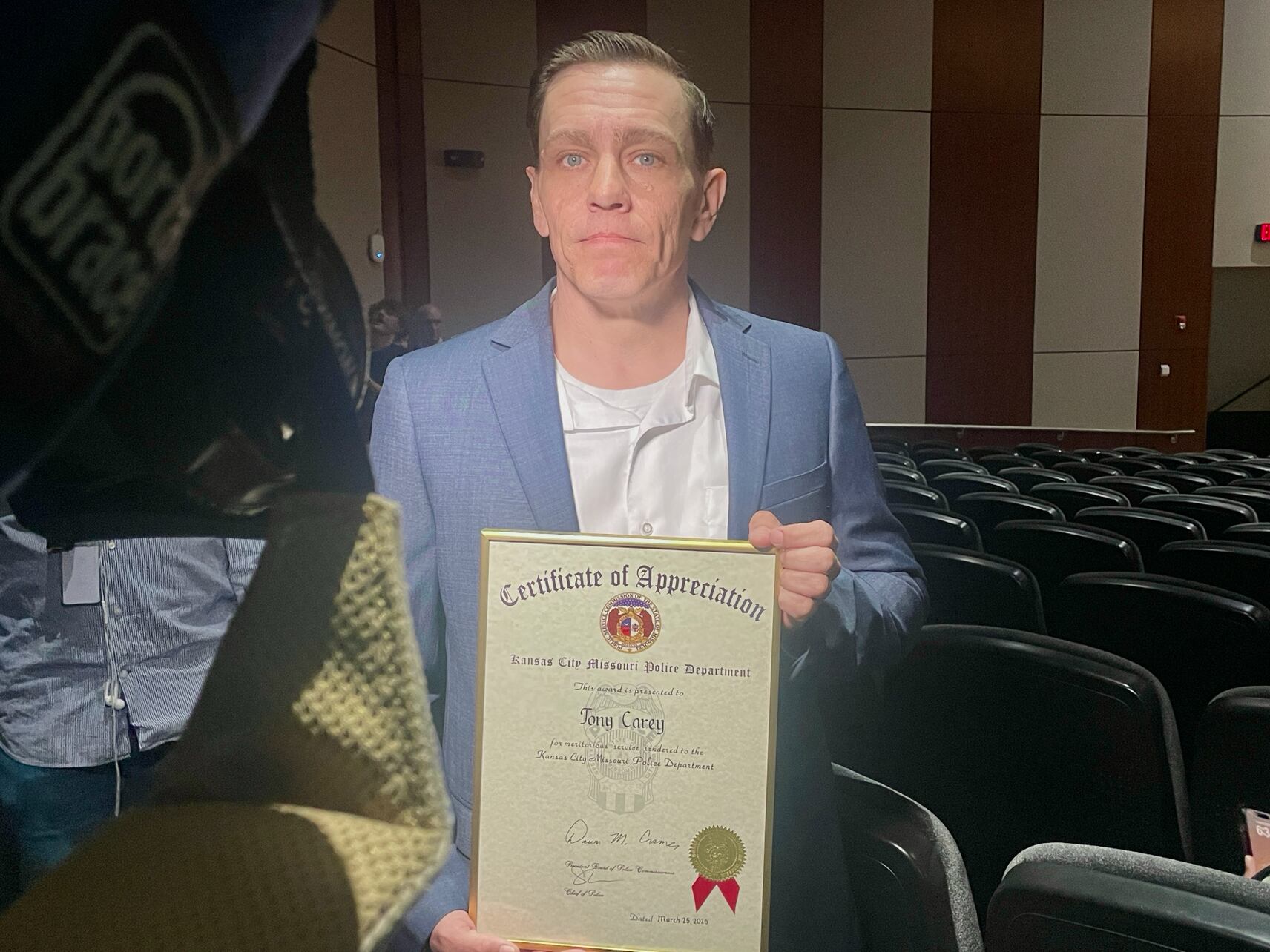 Office worker honored for saving life of KCPD officer