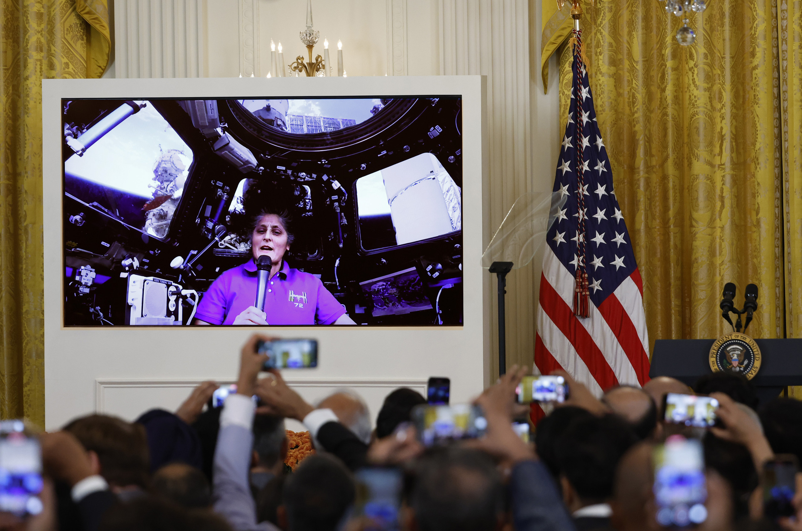 How much will NASA astronauts earn for delayed space mission return?