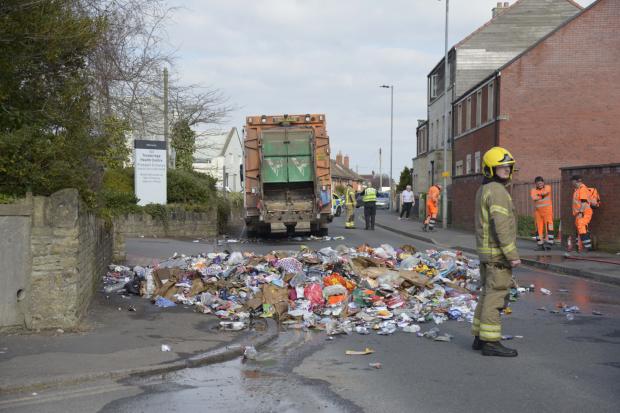 Emergency crews block off town centre road for bin lorry fire