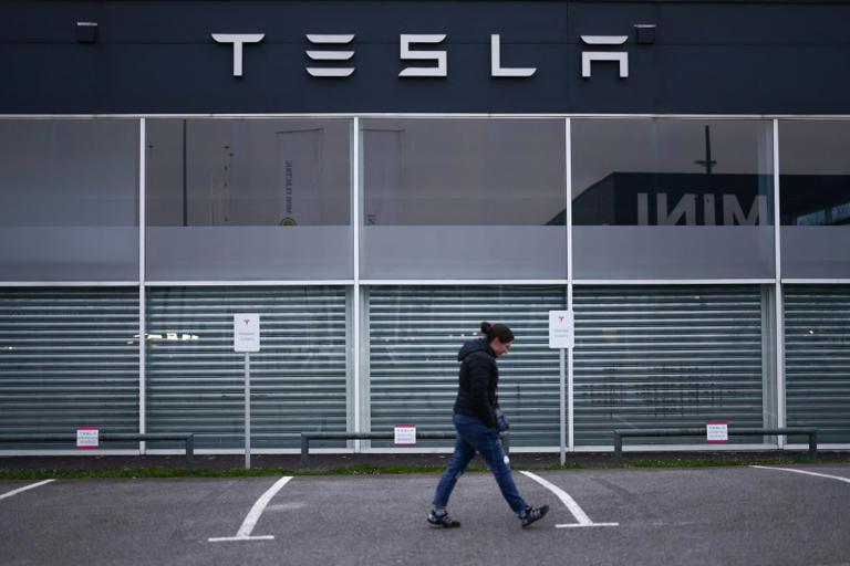 Canada bars Tesla from future EV rebate programs, freezes payments amid ...