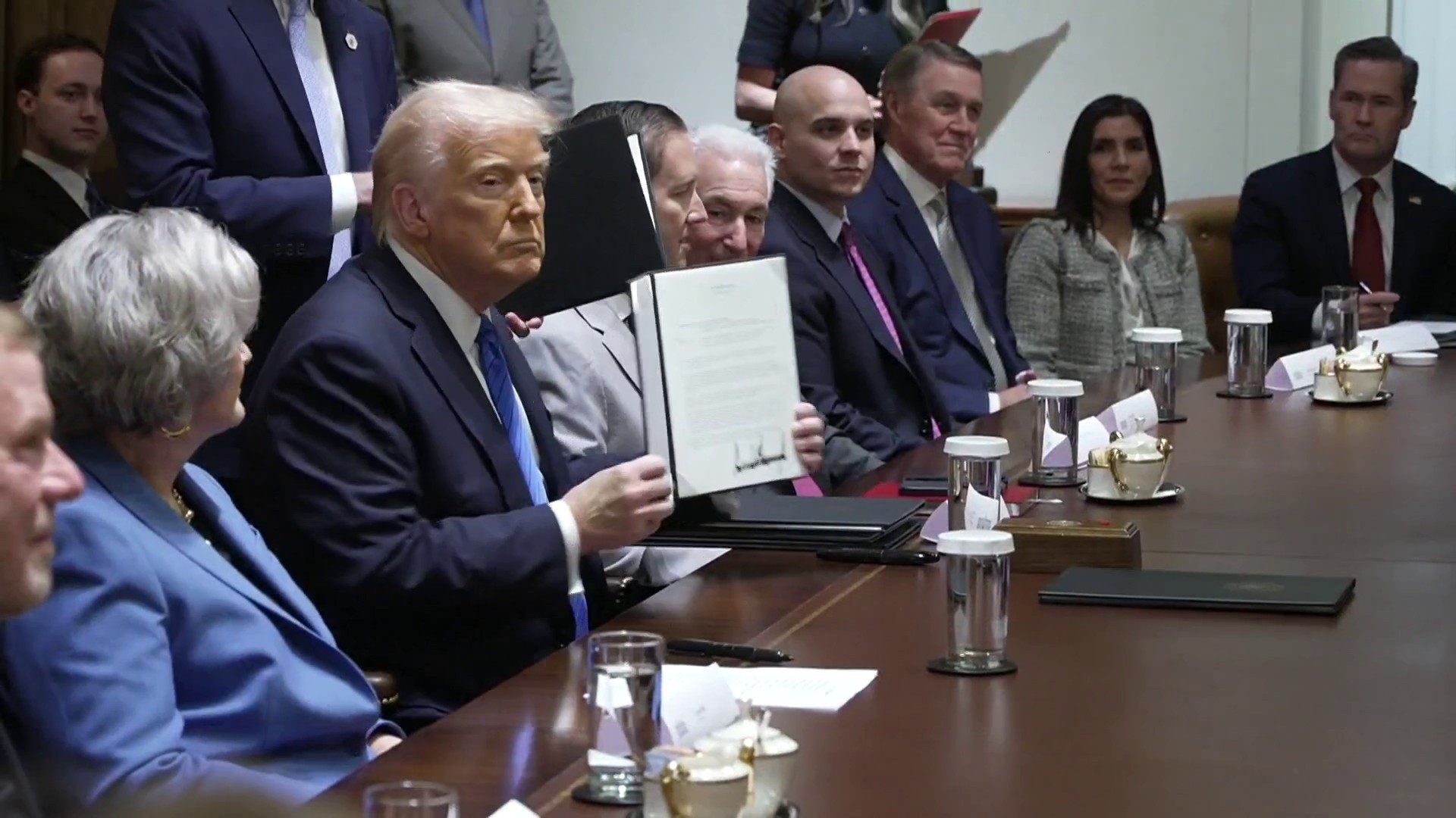 Trump signs order requiring proof of citizenship to register to vote