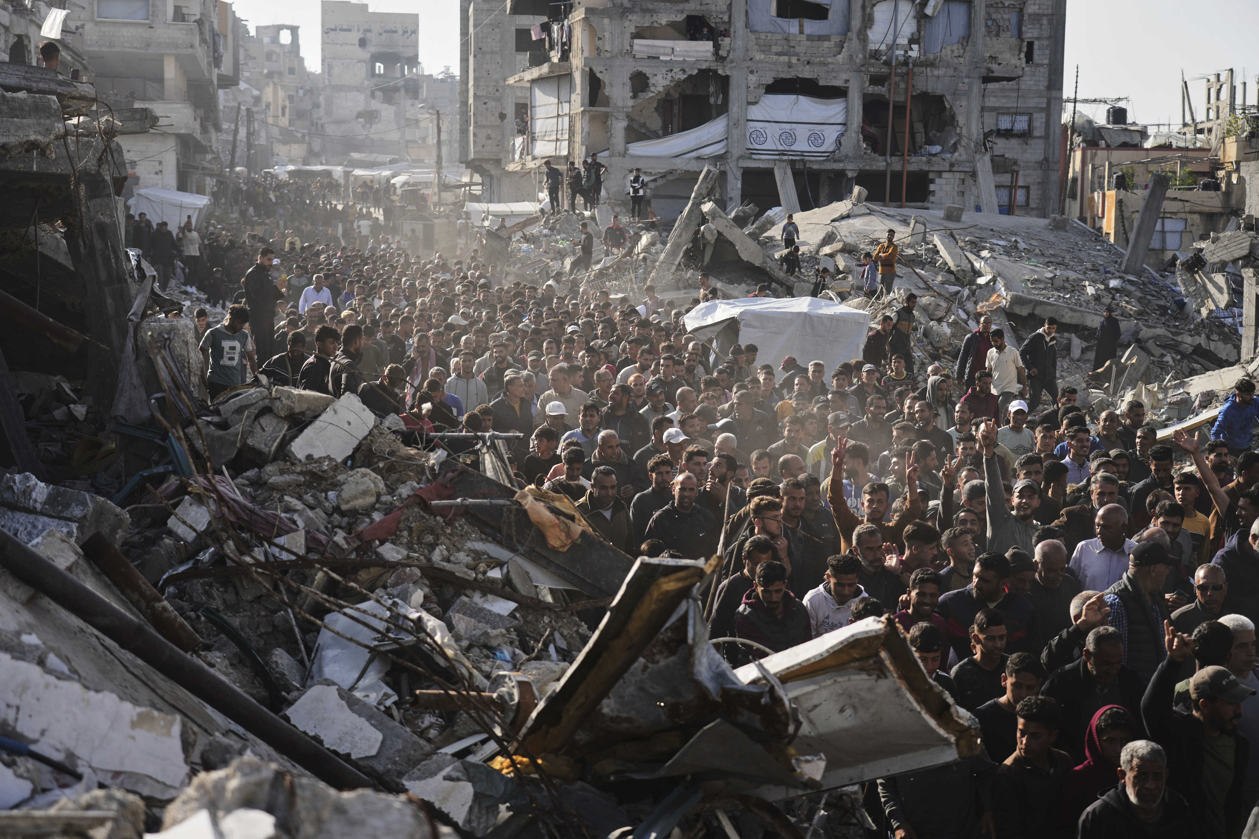 Amid rubble of Gaza, protesters decry Hamas