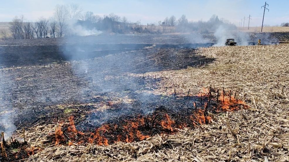Controlled burn around La Plata area pond spreads to cornfield
