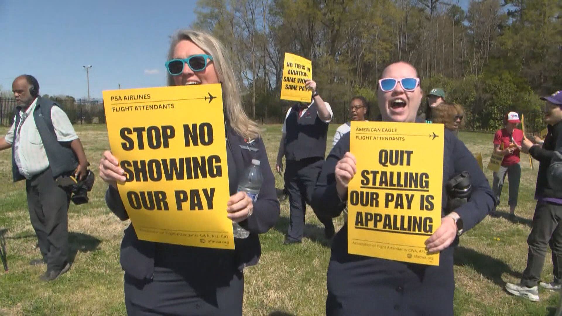 PSA flight attendants picket for equal pay to American Airlines ...