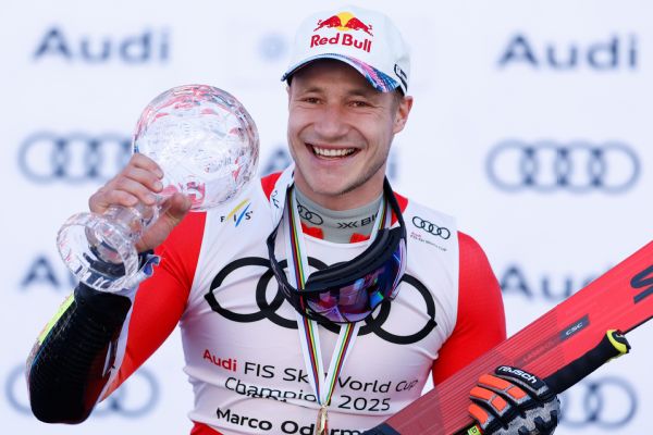 Odermatt wins GS world title, breaks crystal trophy celebrating
