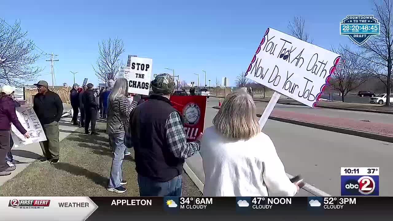 Demonstrators protest outside Rep. Tony Wied’s office, claim he’s not ...