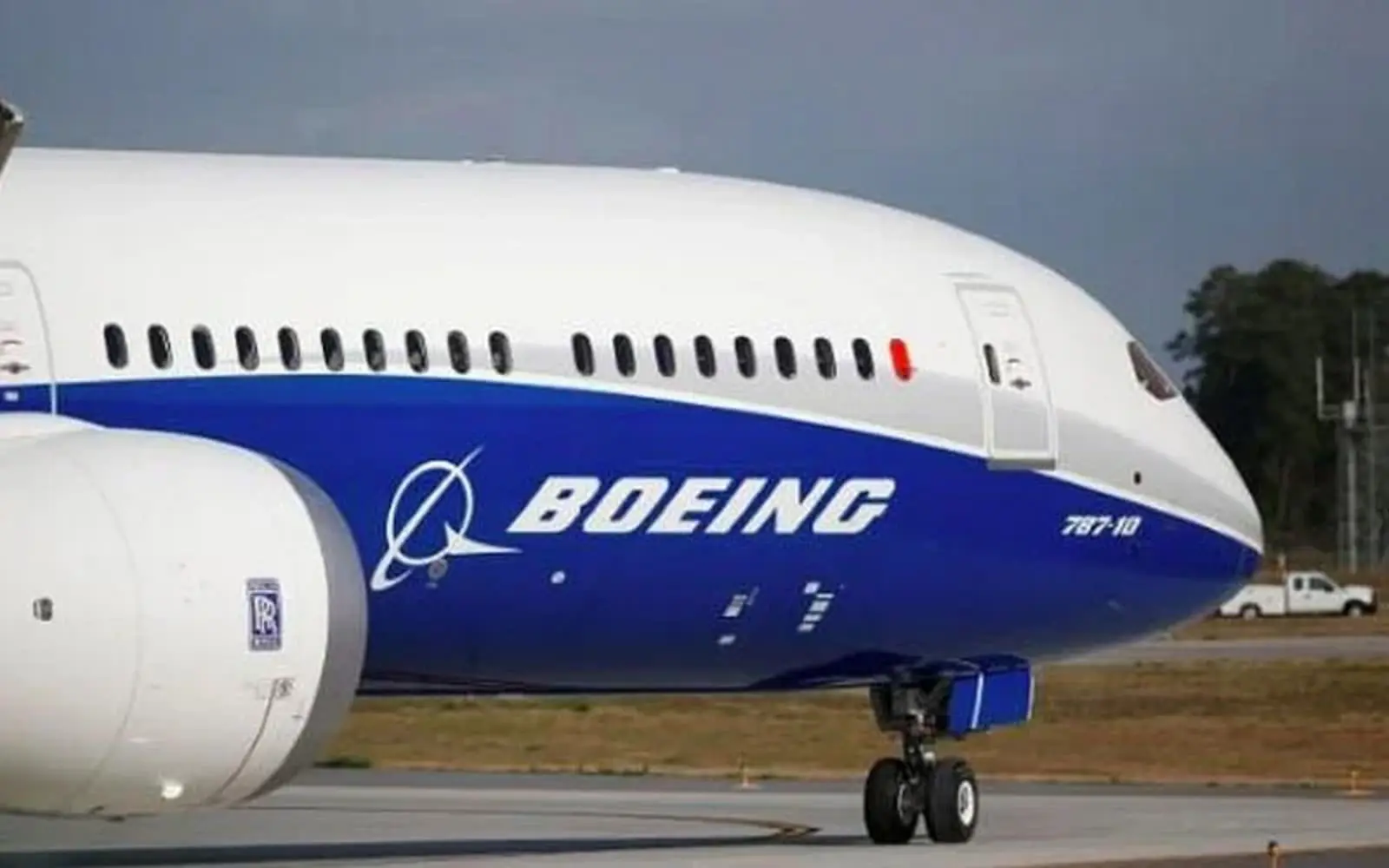 Boeing posts smaller loss as jet deliveries rise
