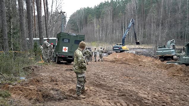 Rescuers dig for missing US soldiers' vehicle in Lithuania
