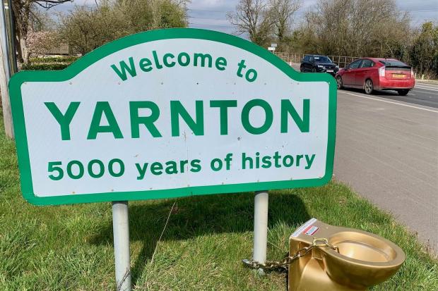 Locals flushed with confusion as mystery gold toilet appears