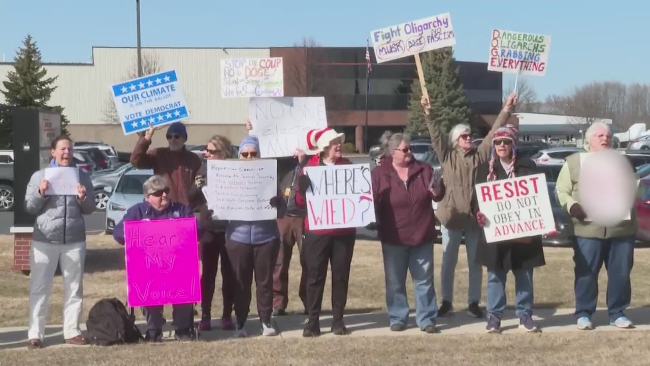 Activist group protests outside Rep. Tony Wied’s De Pere office