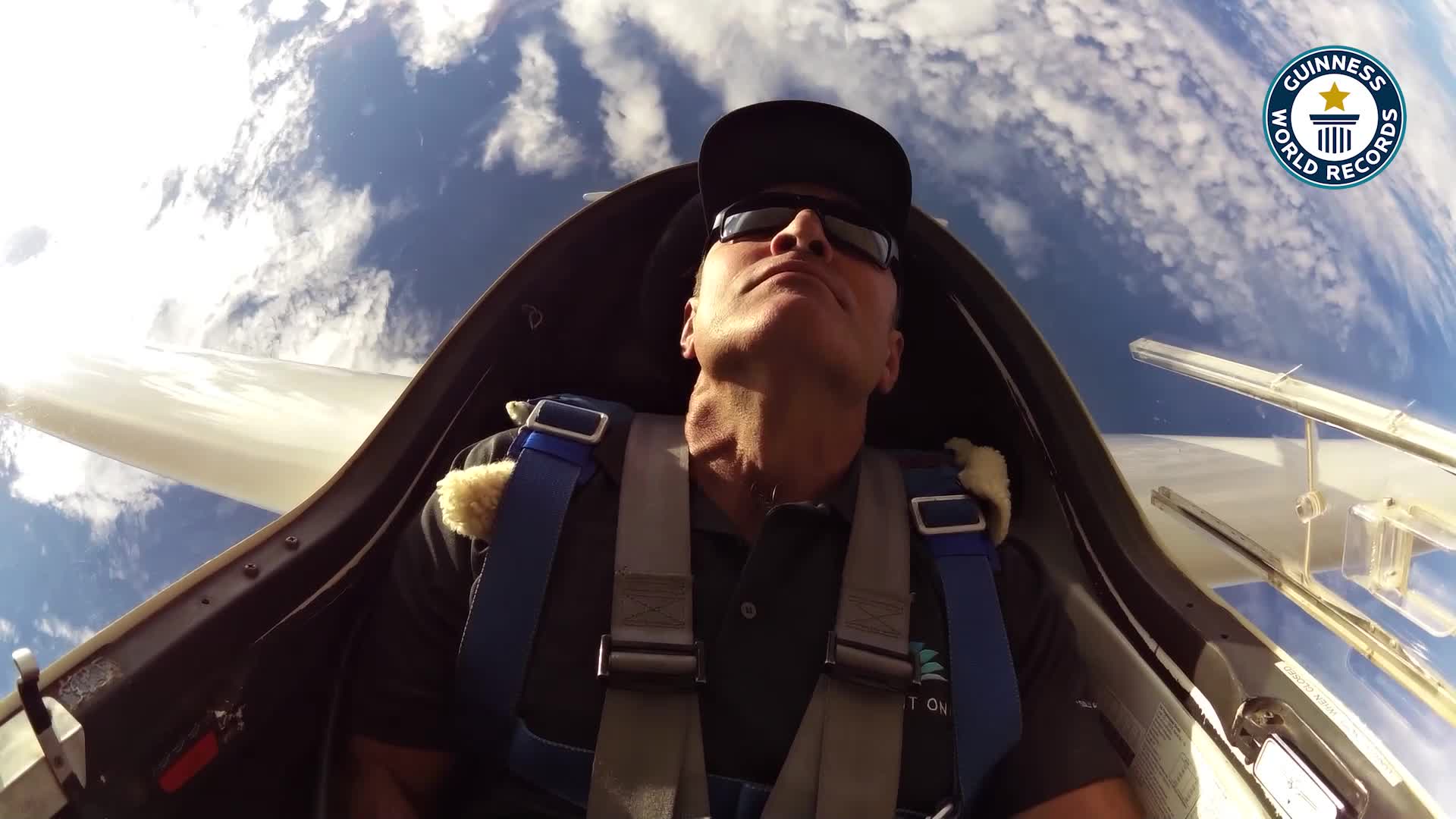 Father and son perform most loops in an airborne glider